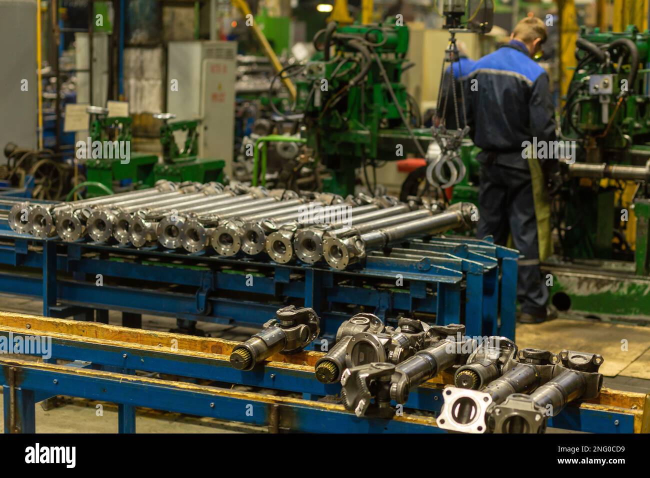 Cardan shafts and gimbal transmissions moving on conveyor during ...