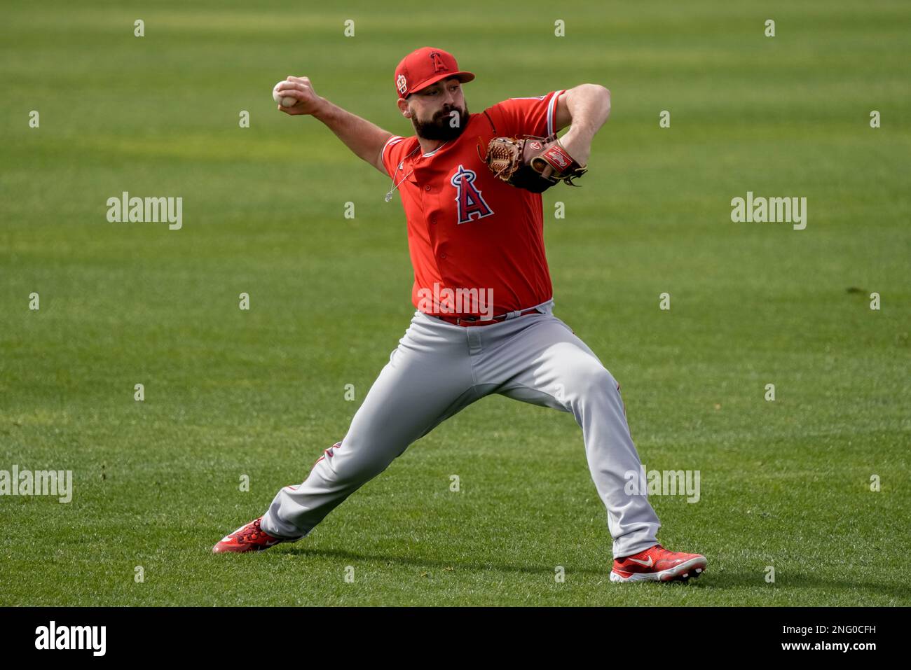Los Angeles Angels' Tim Buss throws during a spring training baseball ...