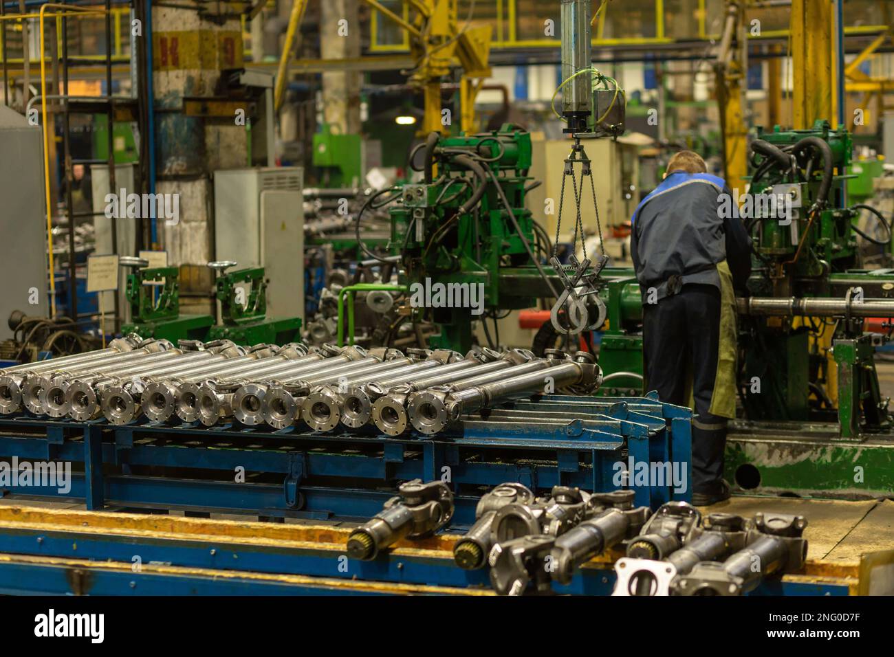 Cardan shafts and gimbal transmissions moving on conveyor during ...