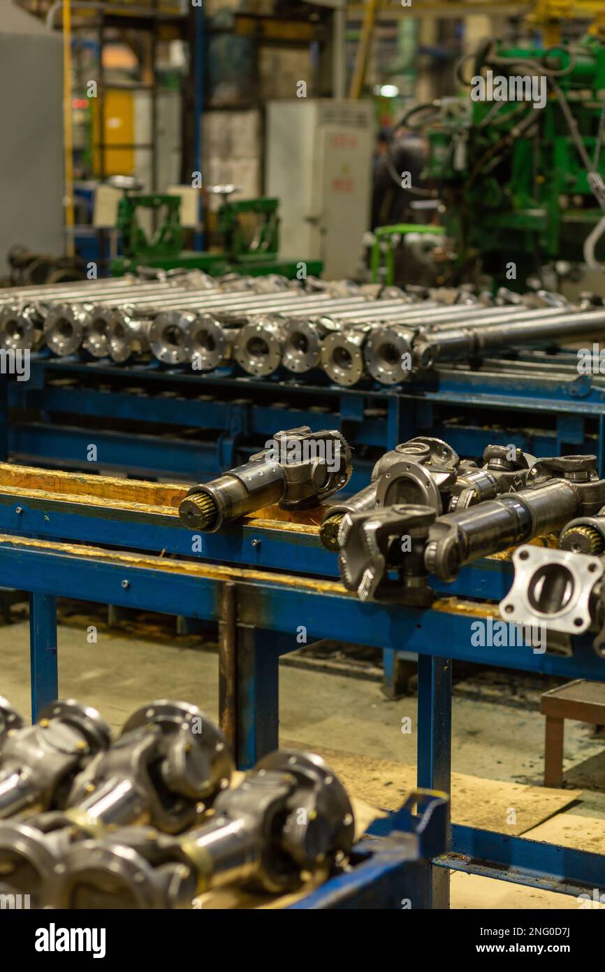 Cardan shafts and gimbal transmissions moving on conveyor during ...