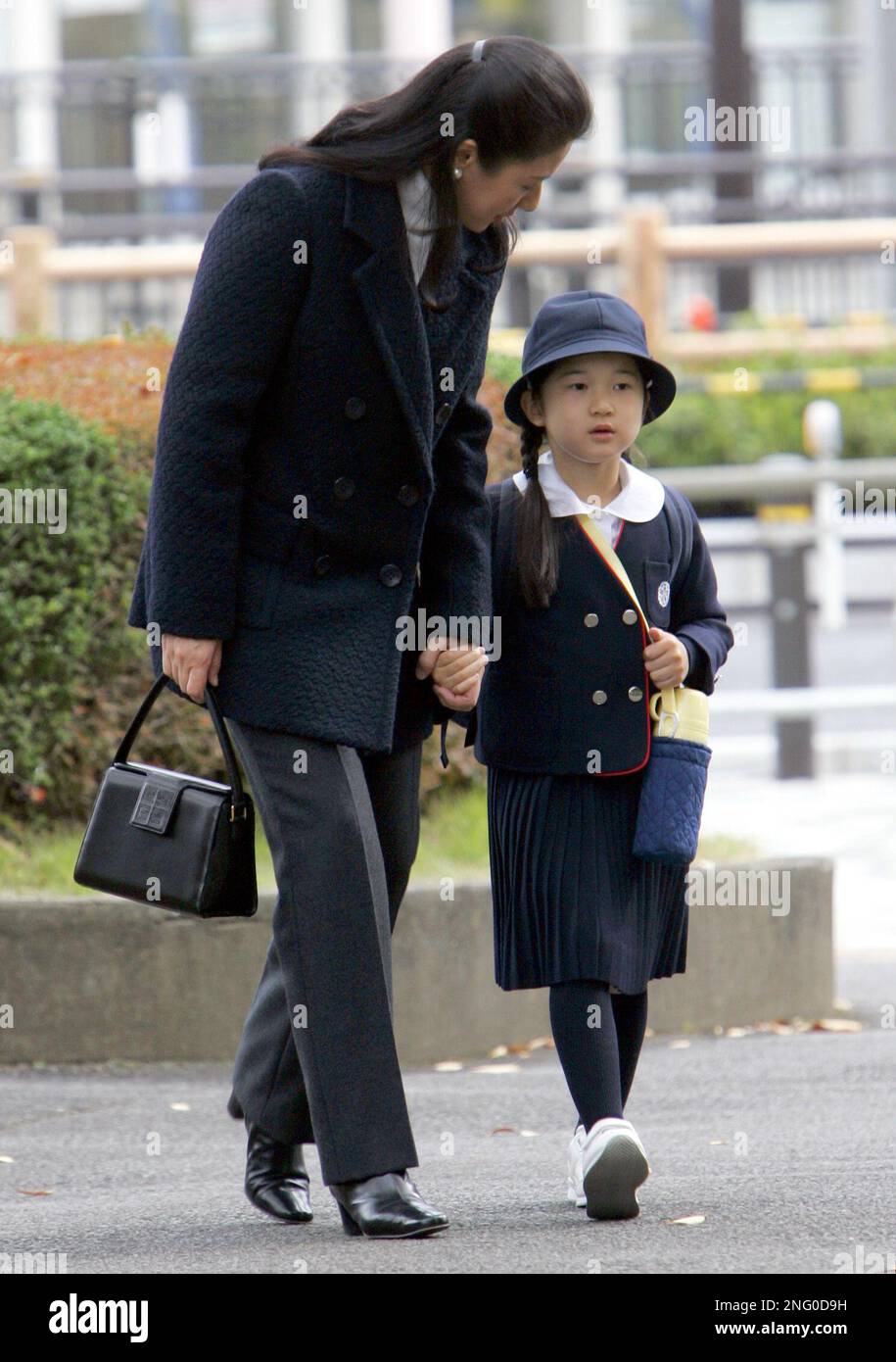Japan's Crown Princess Masako, left, and her daughter Aiko arrive at a ...