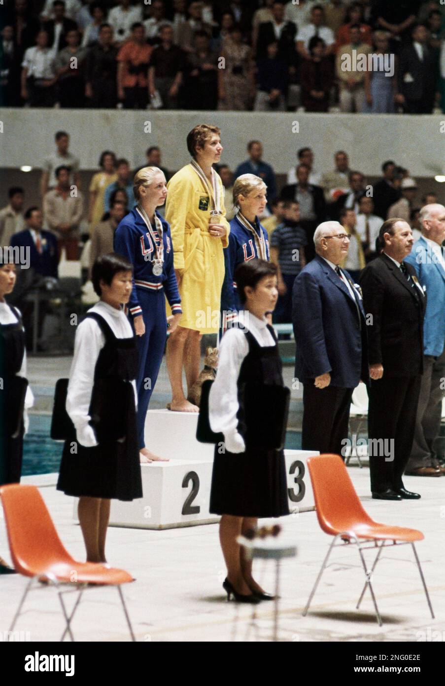 Dawn Fraser of Australia, is flanked by Sharon Stouder, second place ...