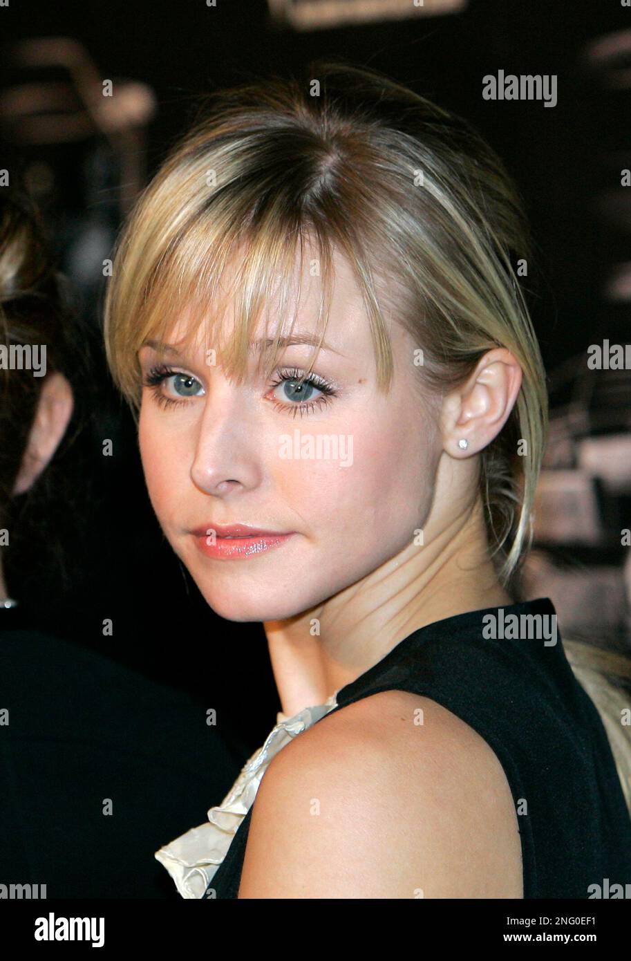 Kristen Bell poses as she arrives at a party to celebrate the opening ...