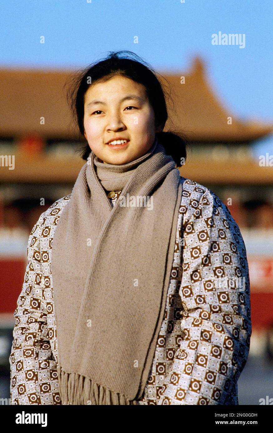 Pictured here is an unidentified woman at the Forbidden City in Beijing ...