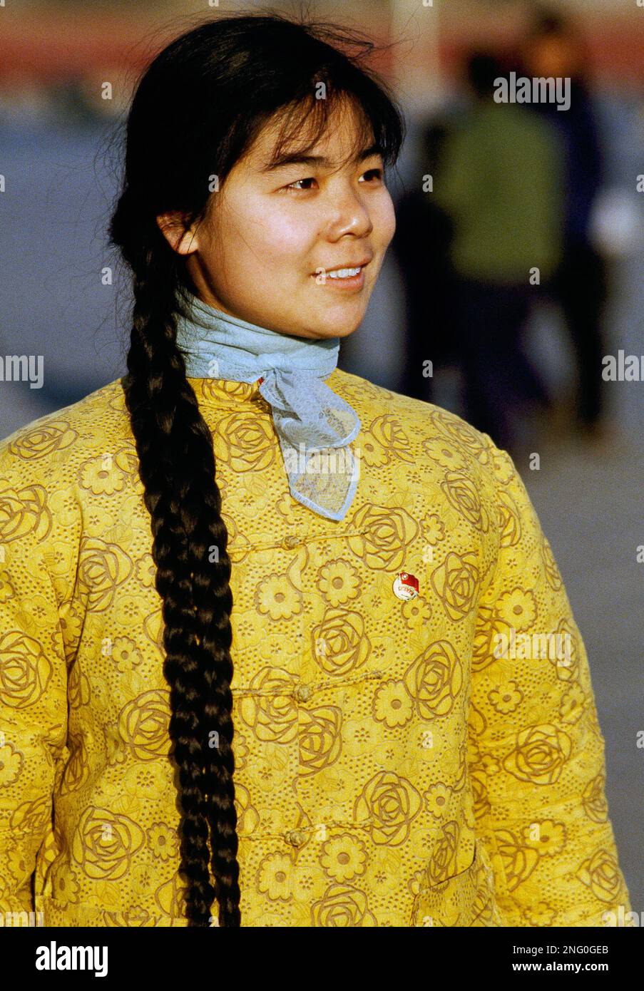 Pictured here is an unidentified woman at the Forbidden City in Beijing ...