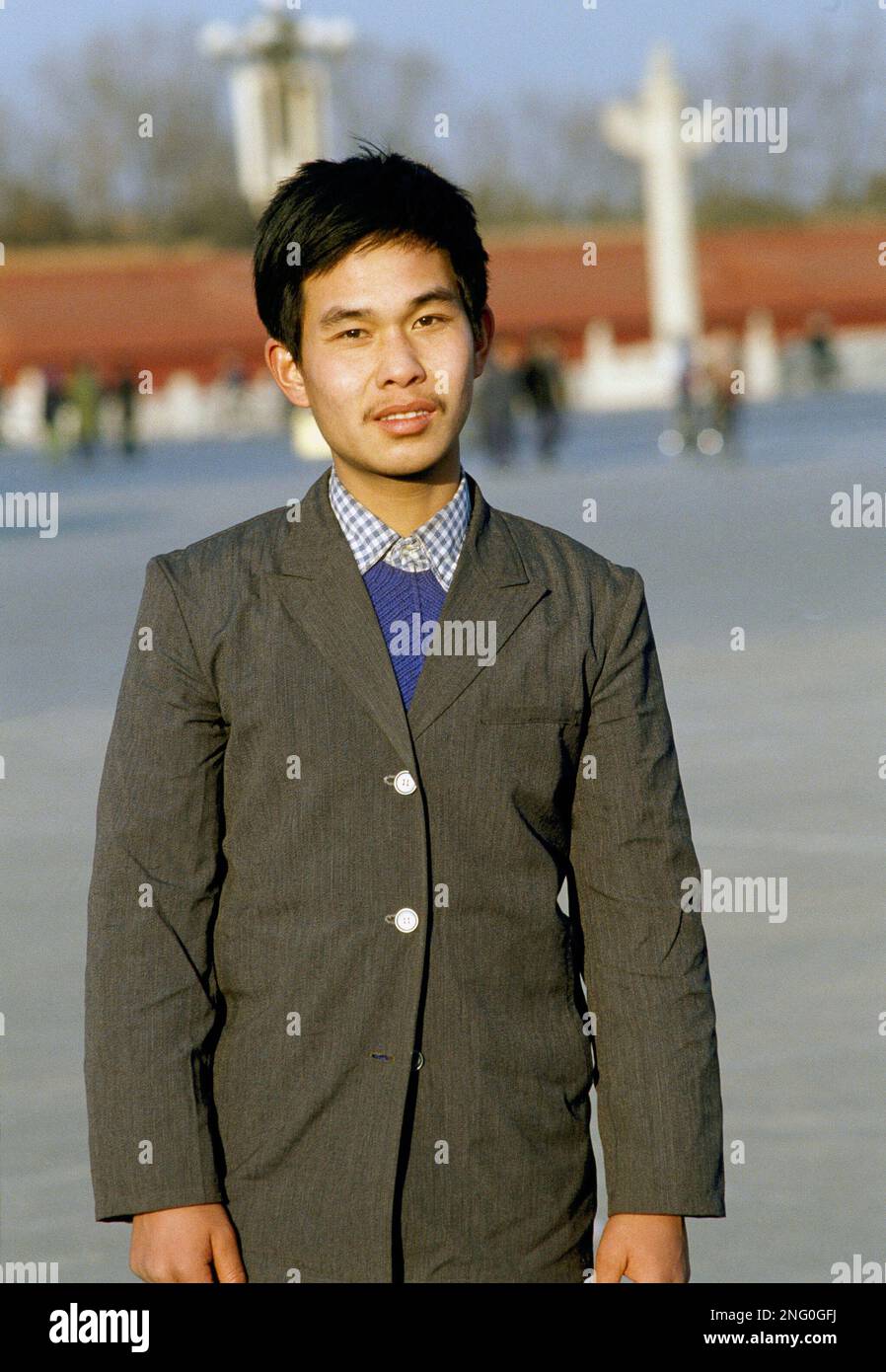 Pictured here is an unidentified man at the Forbidden City in Beijing ...