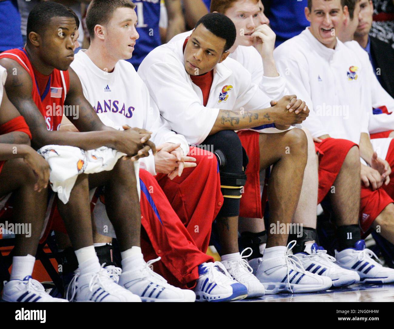 Kansas guard Brandon Rush (25) sits on the bench during the first half ...