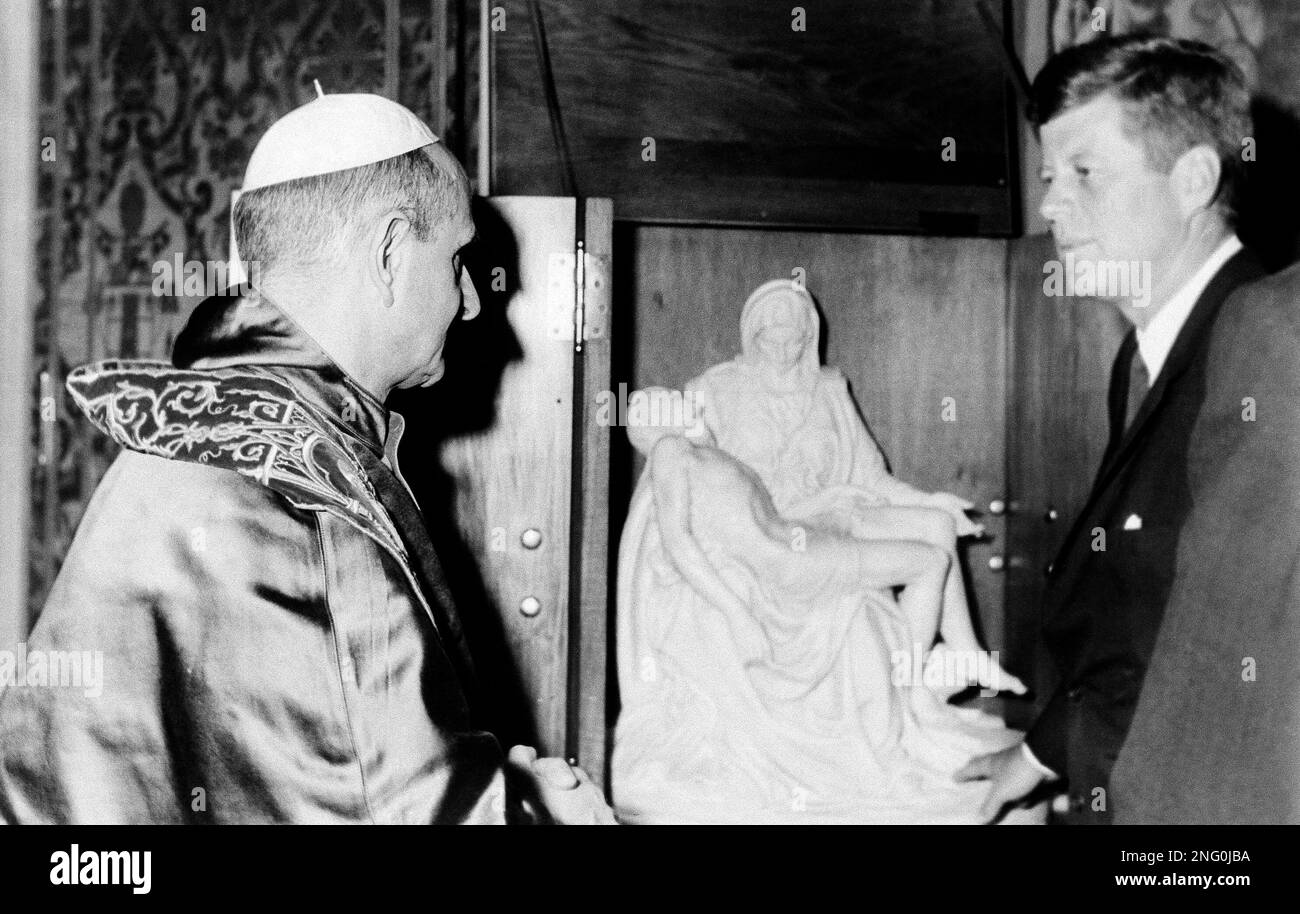 Pope Paul VI and President John F. Kennedy stand near model of the ...
