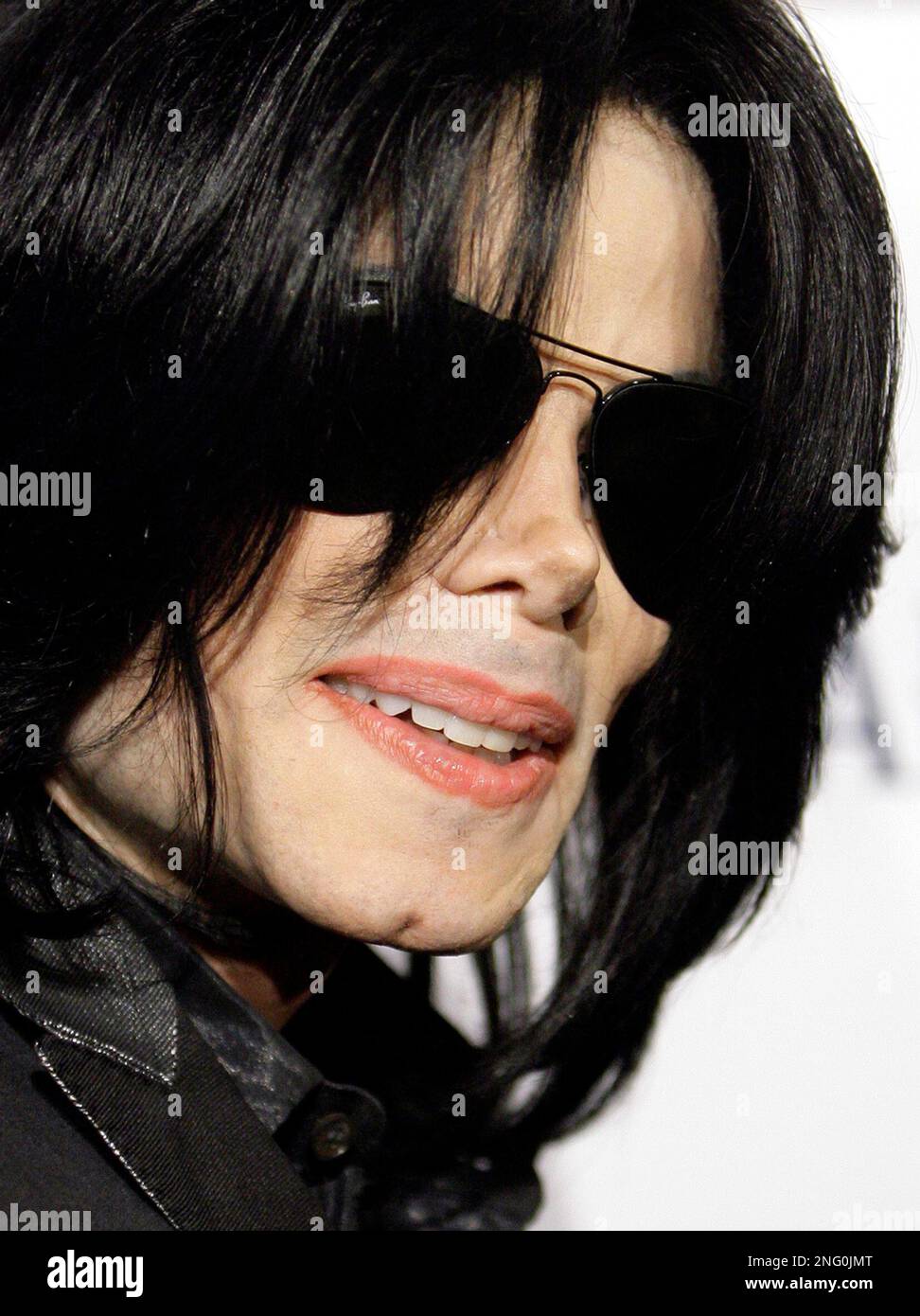 Pop star Michael Jackson poses on the red carpet during the RainbowPUSH ...