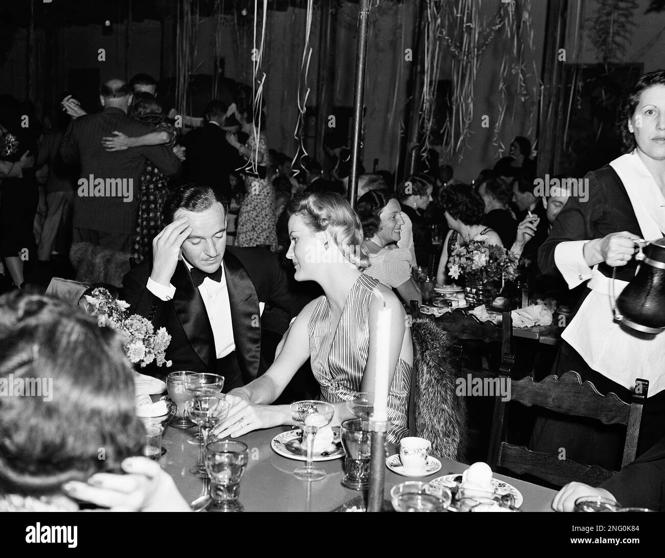 Mrs. Doris Duke Cromwell, tobacco heiress, is shown deep in ...