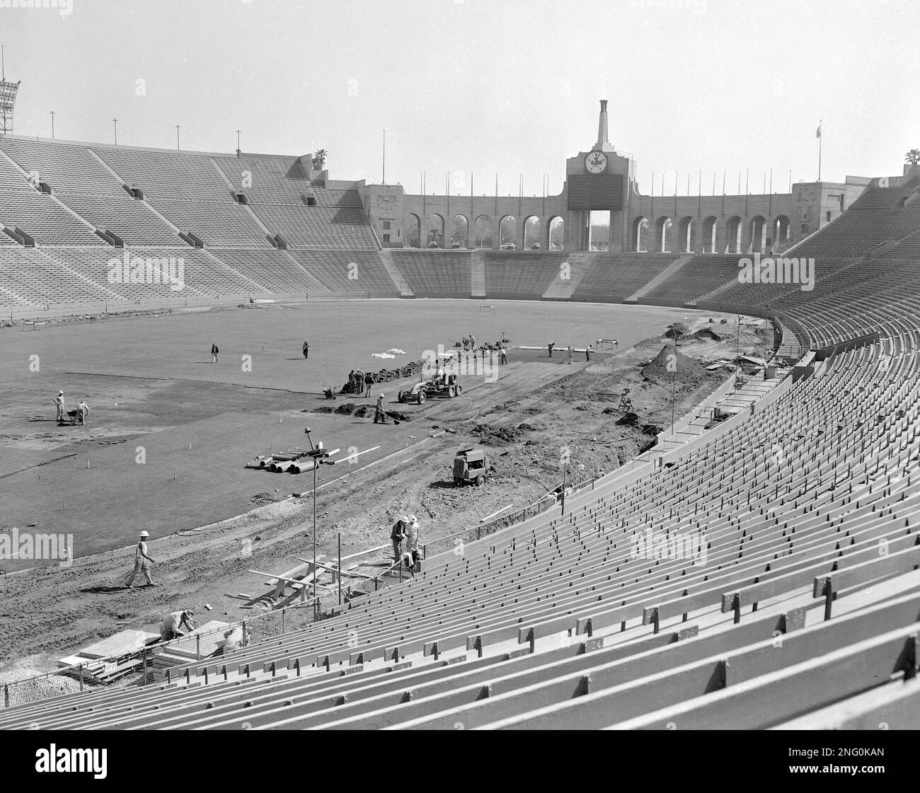 A work crew prepares the Los Angeles Coliseum for the Los Angeles ...