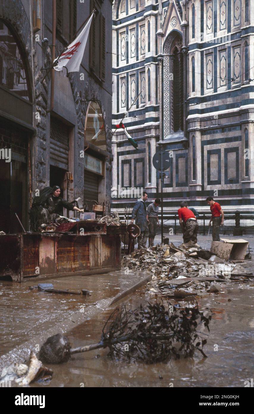 Seen is the mud and debris in the streets of Florence, Italy in the ...