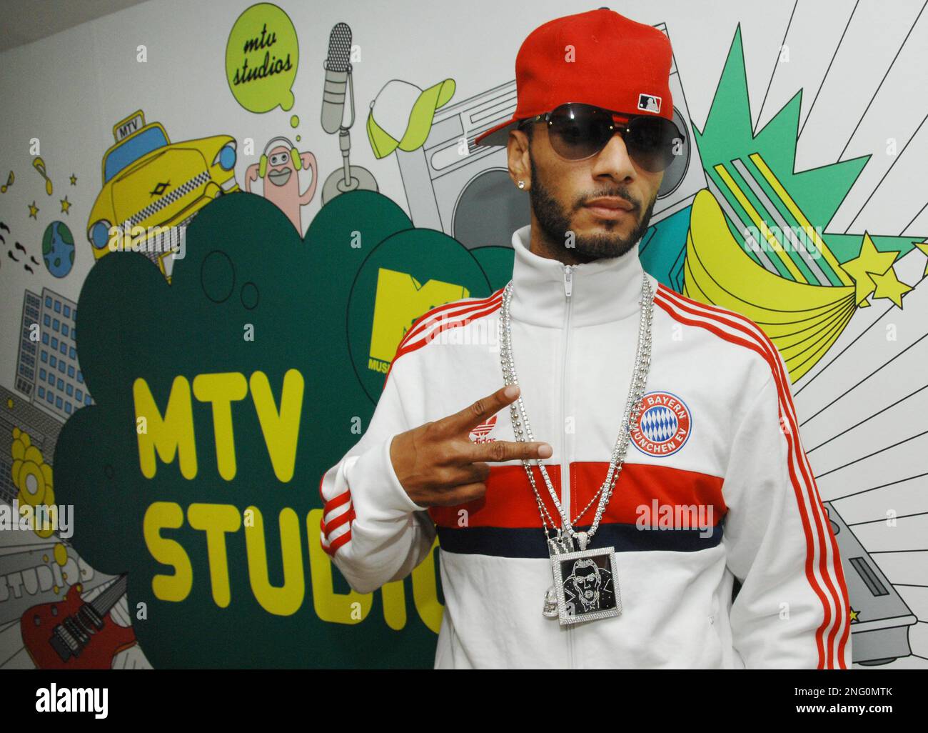 Rapper Swizz Beats poses backstage after making an appearance on MTV's ...