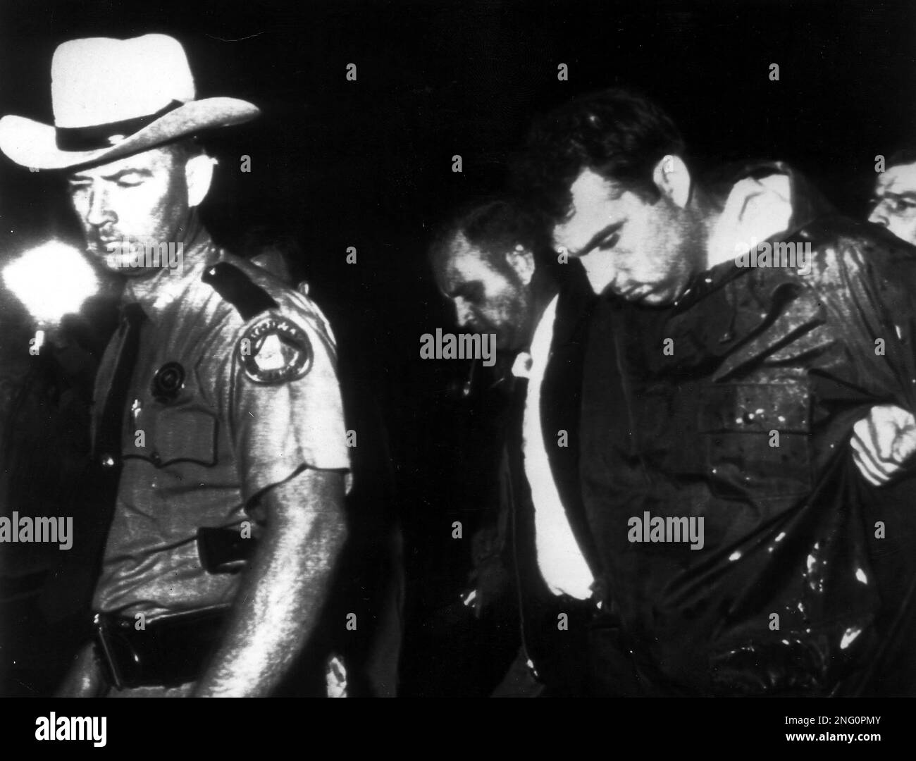 Image shows officers of Florida's State police and FBI with the ...