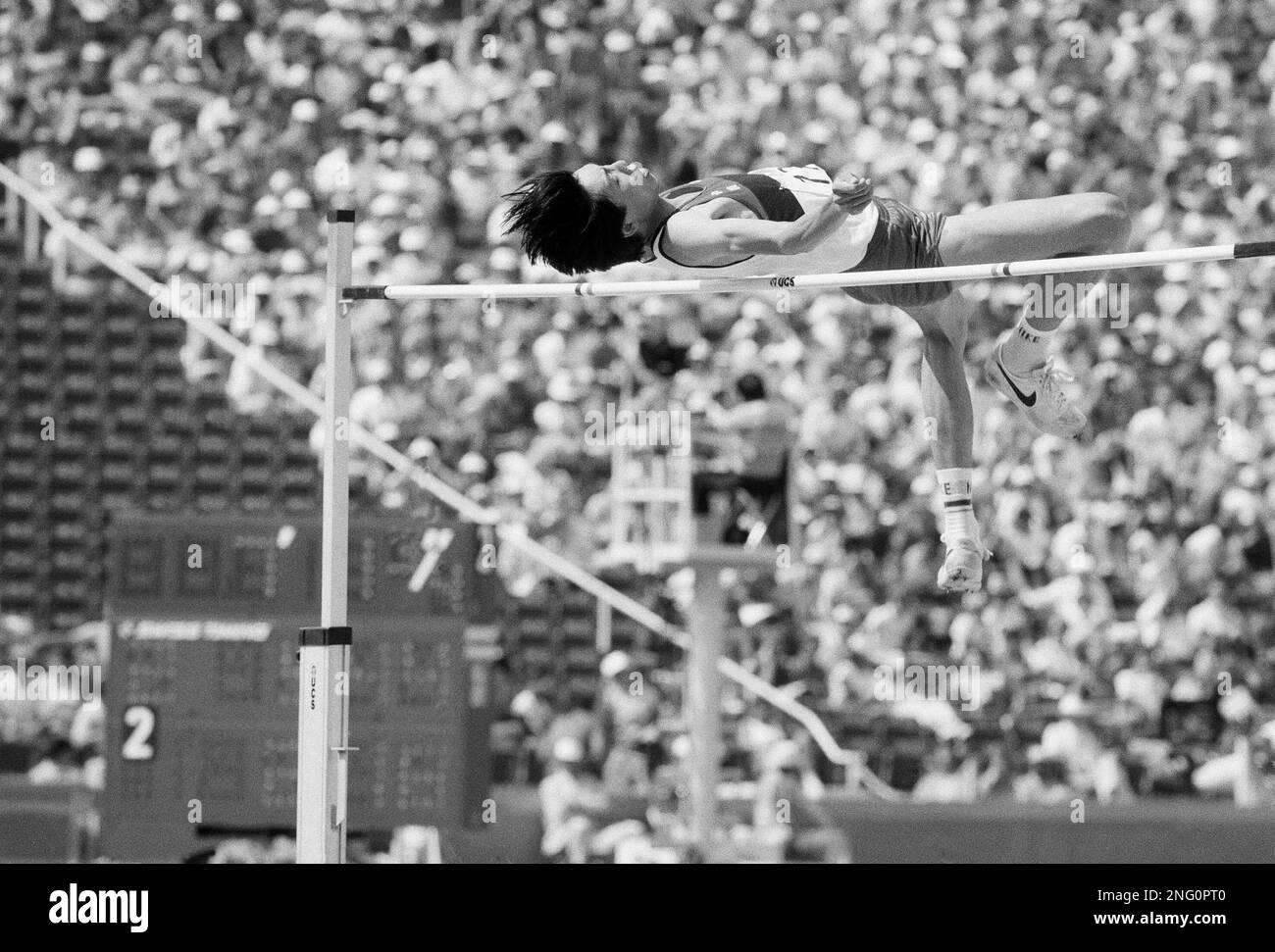 China's Jianhu Zhu, world champion high jumper, clears the bar during ...