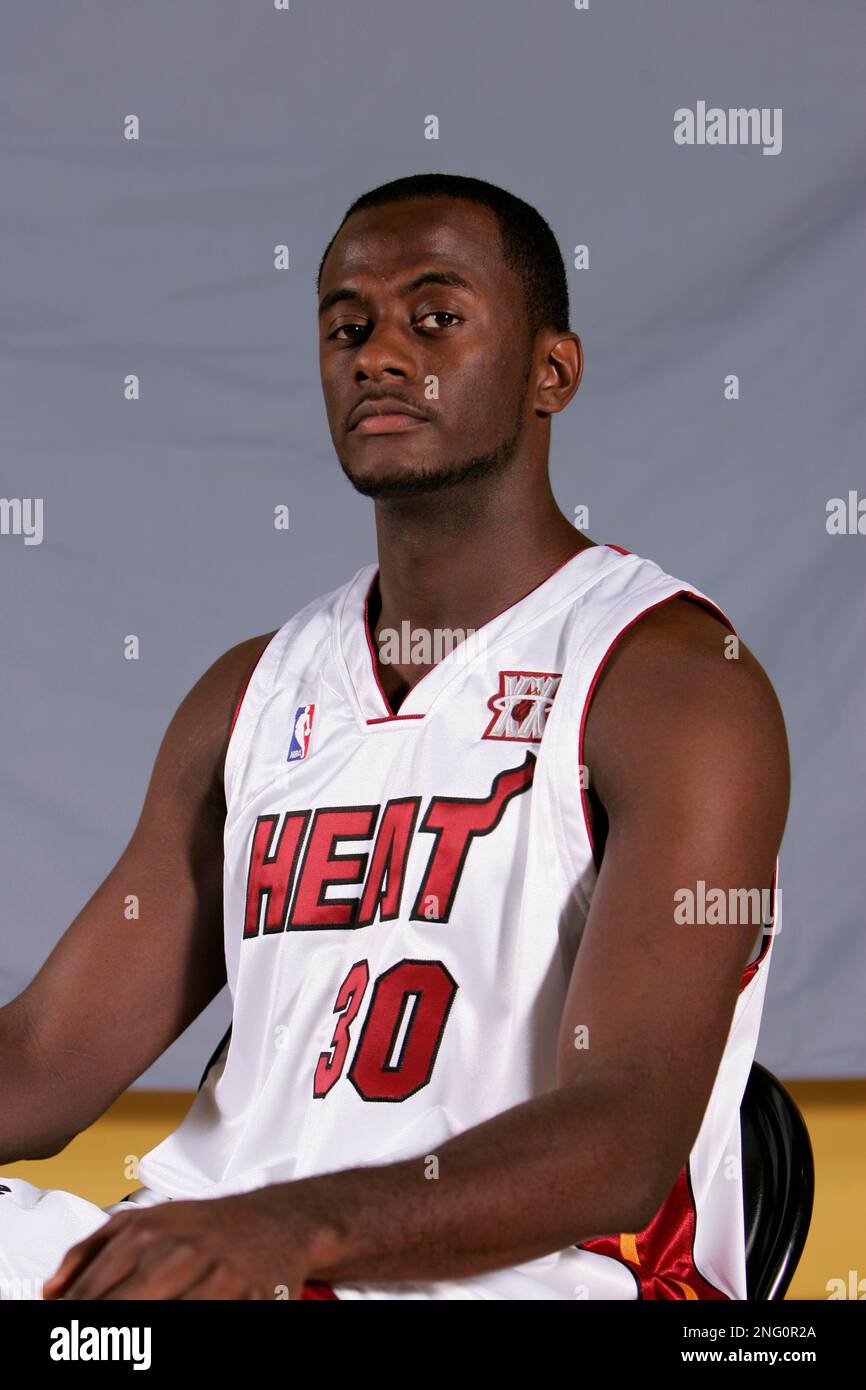 Miami Heat forward Earl Barron (30) poses at media day. (AP Photo/J ...