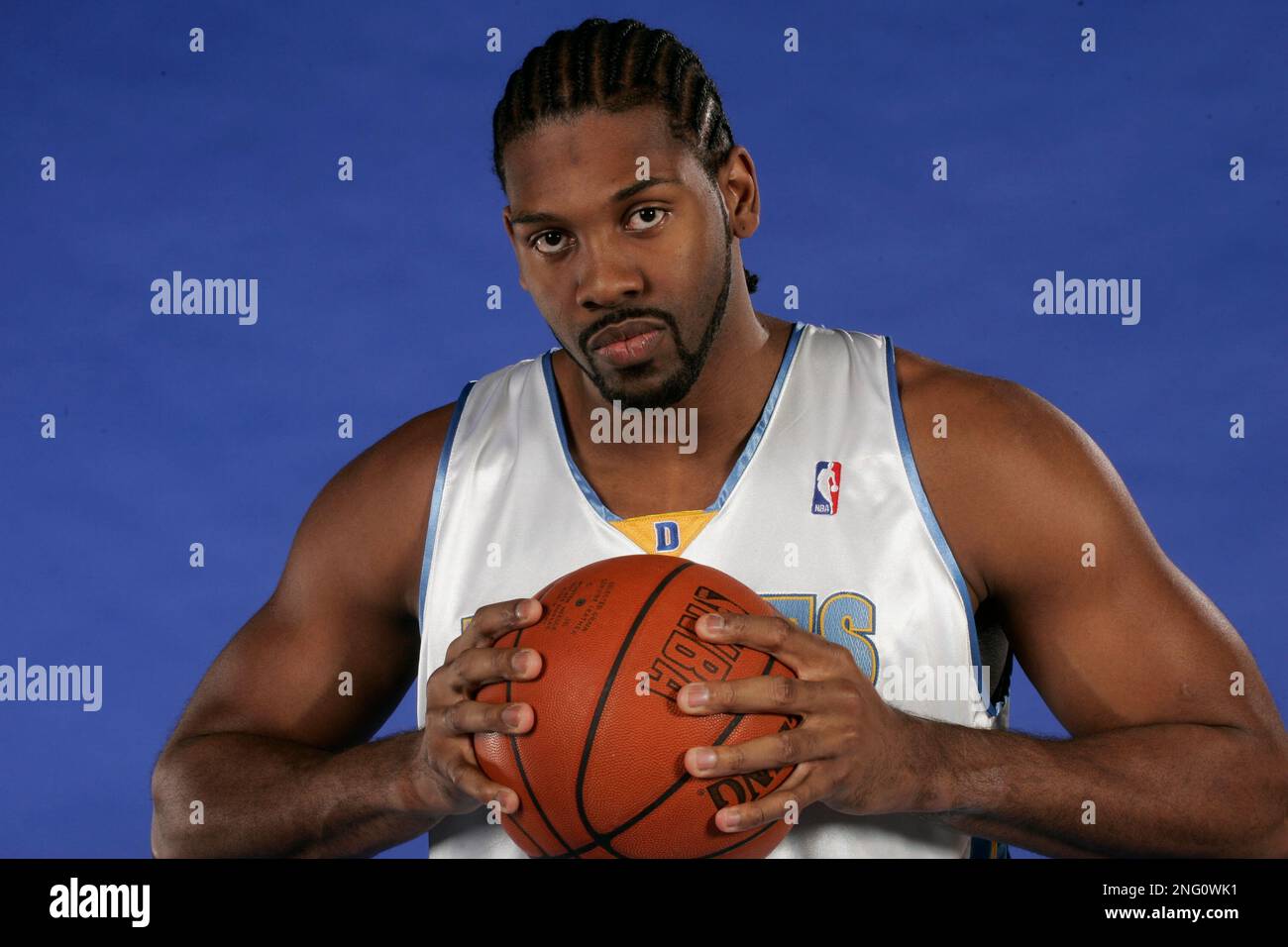 Denver Nuggets forward Nene from Brazil poses for a photo during media ...