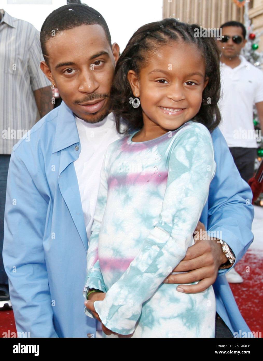 Ludacris, left, and his daughter, Karma Bridges, arrive at the premiere ...