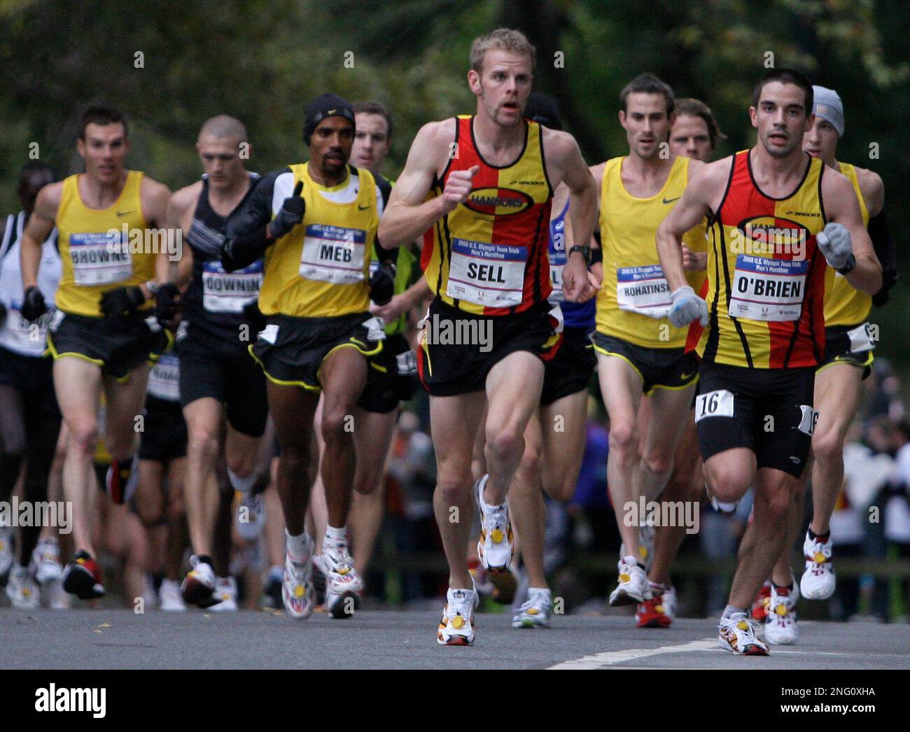Brian Sell, second from right, approaches the six-mile mark during the ...