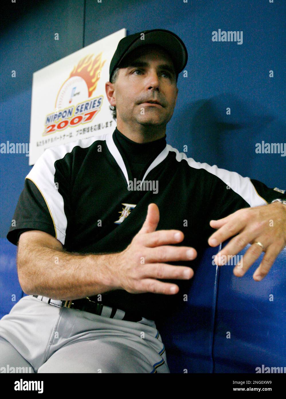 Nippon Ham Fighters manager Trey Hillman gestures as he speaks during ...