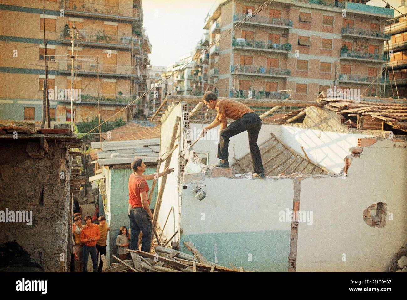 Squatters at the outskirts of Rome demolish their shanty town homes ...
