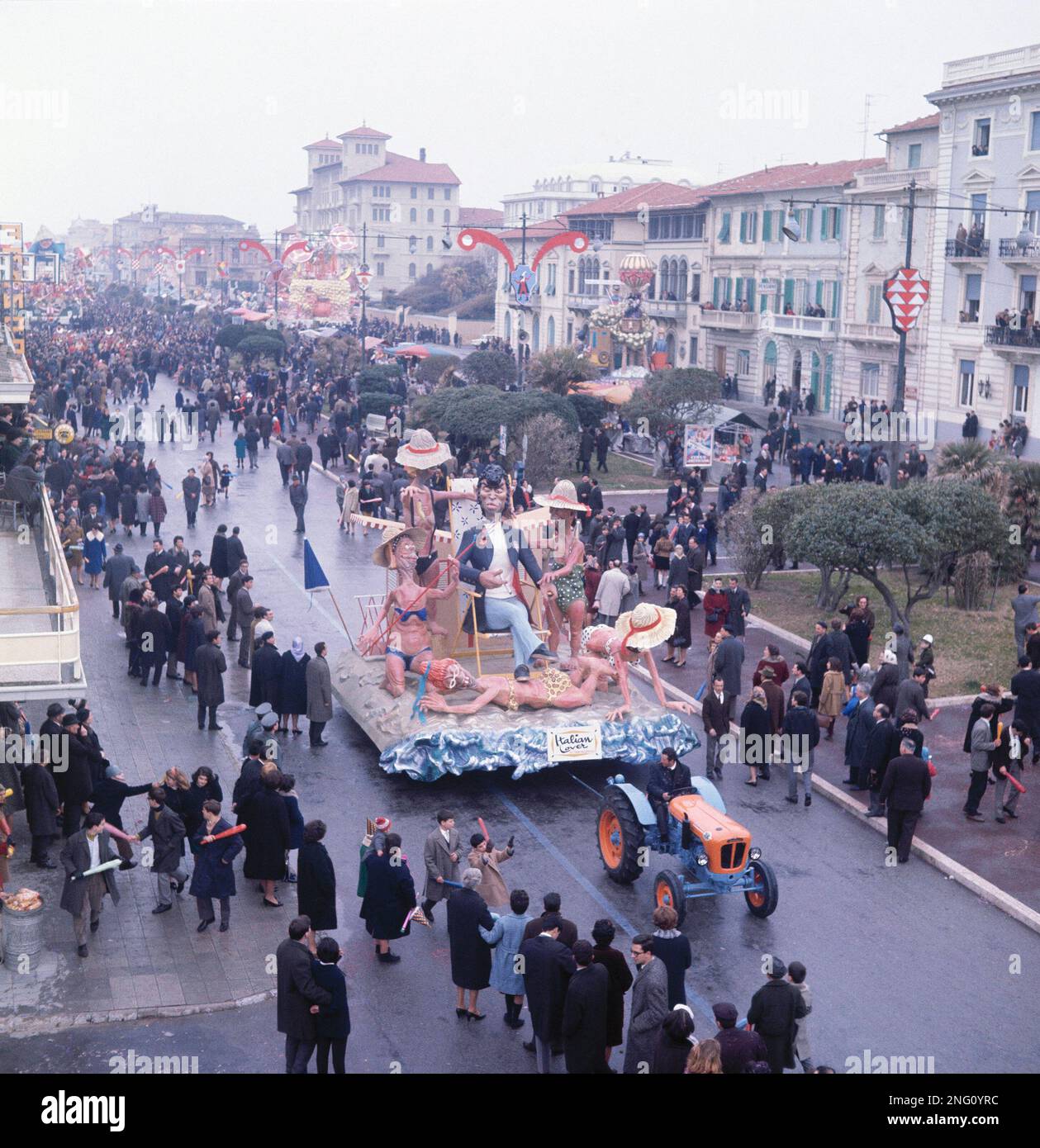 A huge float called the "Latin Lover" moves slowly down the central ...