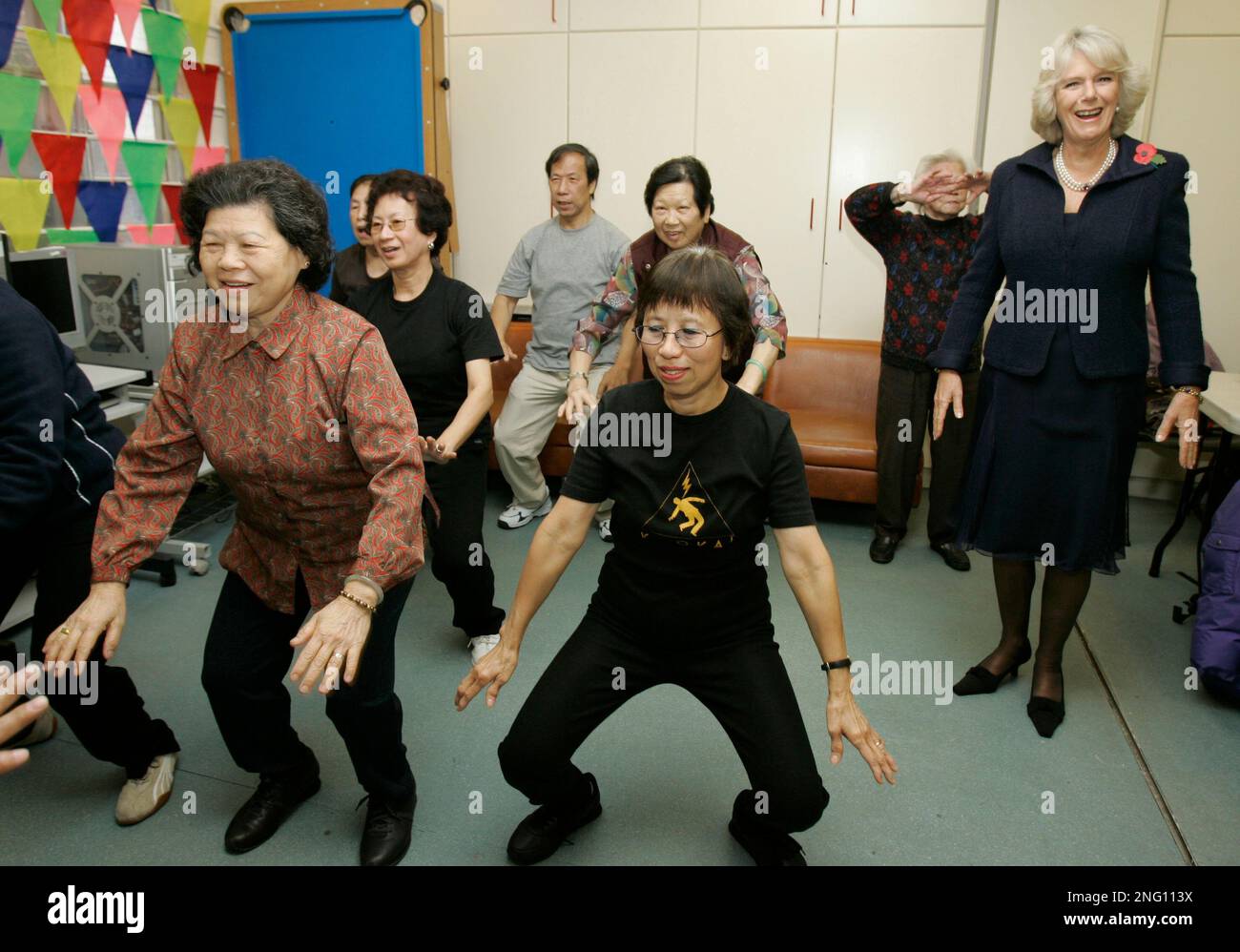 Britain's Camilla Duchess of Cornwall takes part in a tai chi lesson at ...