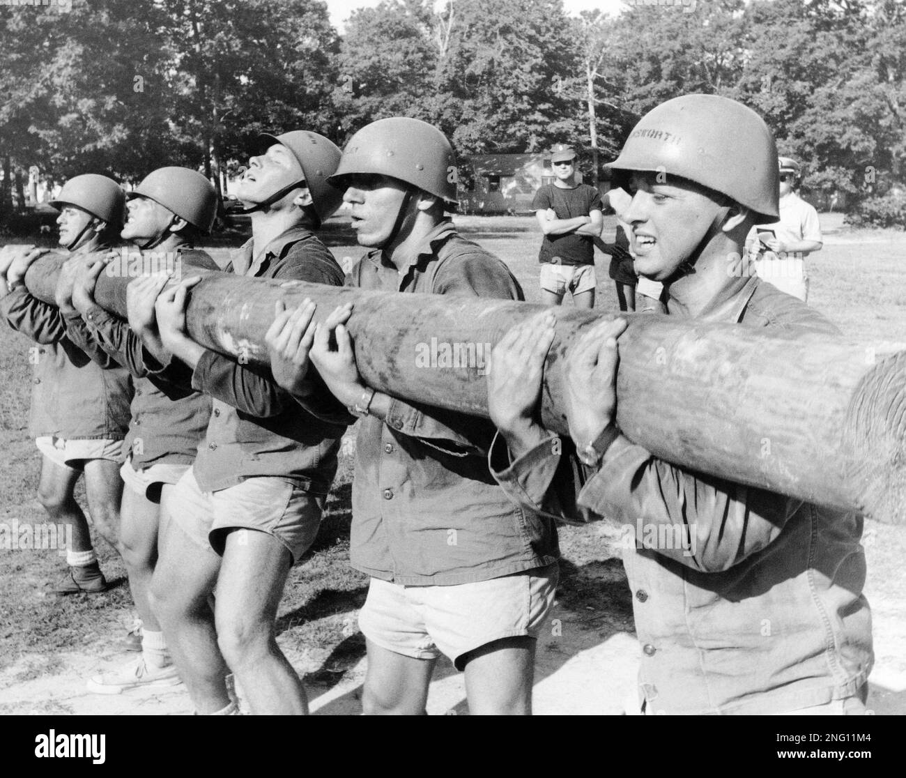 Five trainees from the Underwater Demolition team, also known as ...