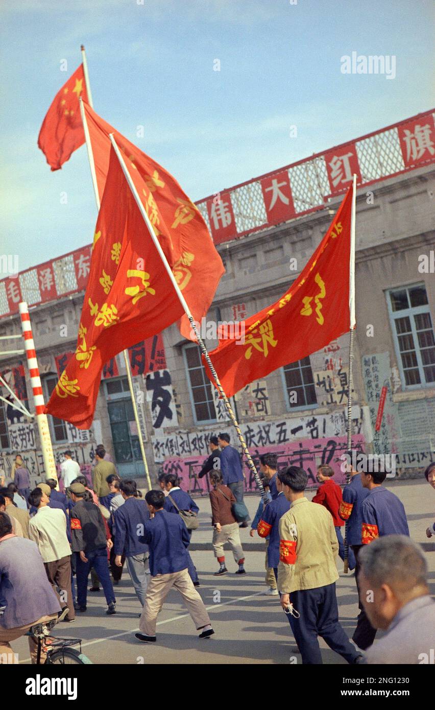People marching in the streets of Beijing on May Day, in the early ...