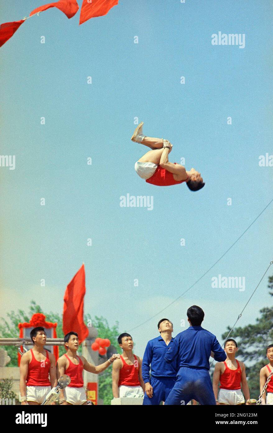 Acrobat performs during entertainment in the park behind Tien An Mien ...