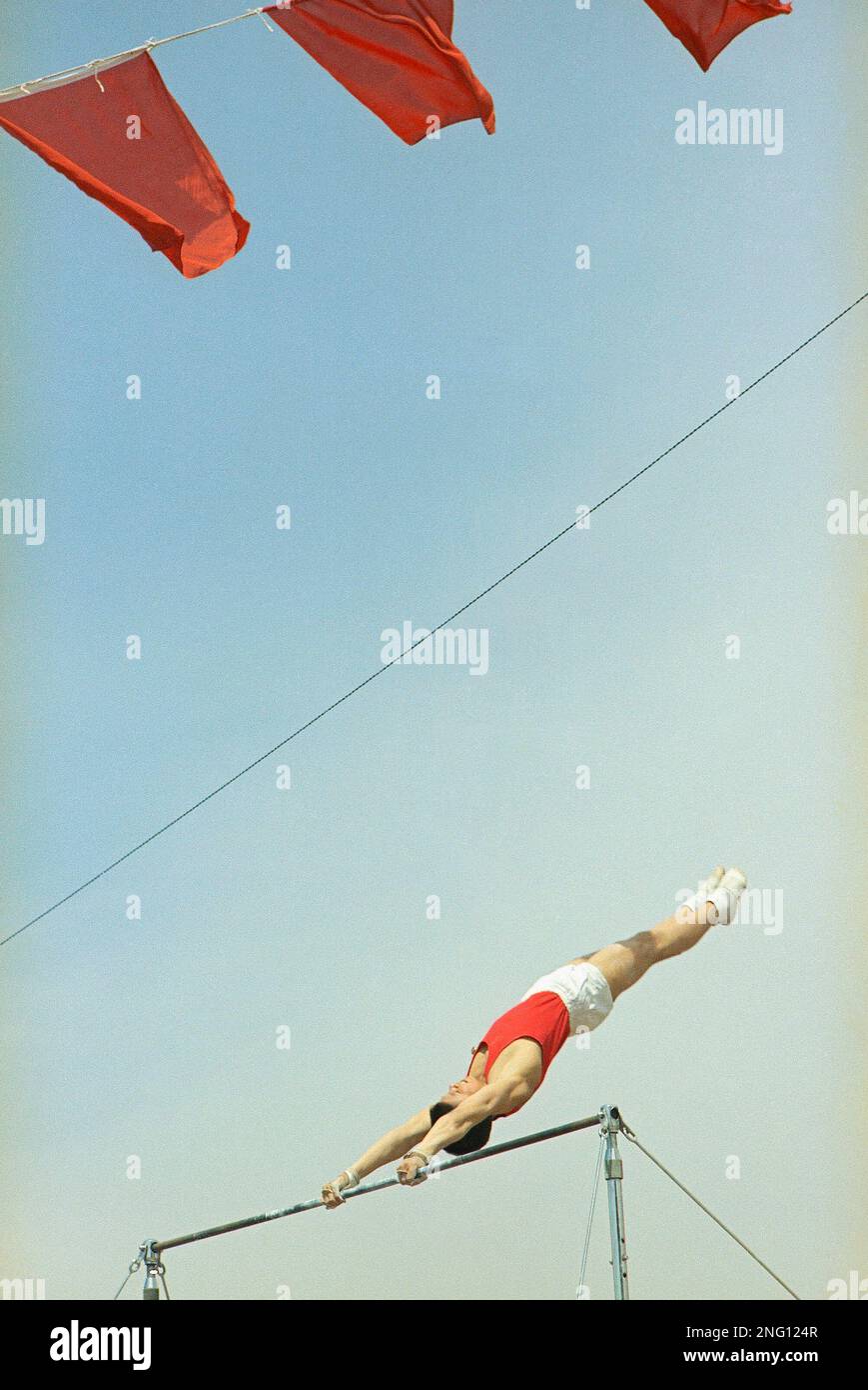 Acrobat performs during entertainment in the park behind Tien An Mien ...