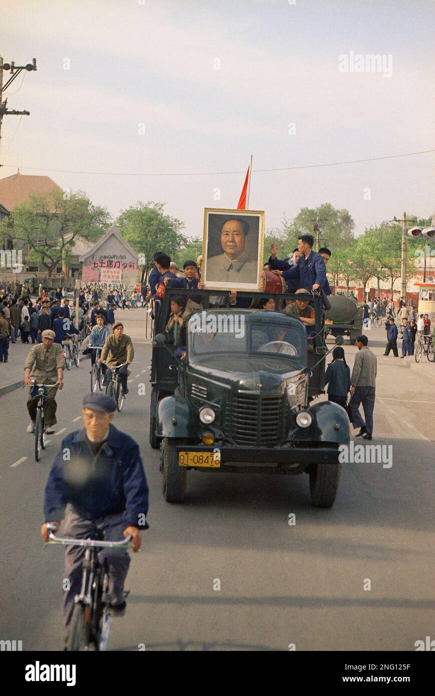 People marching in the streets of Beijing on May Day, in the early ...