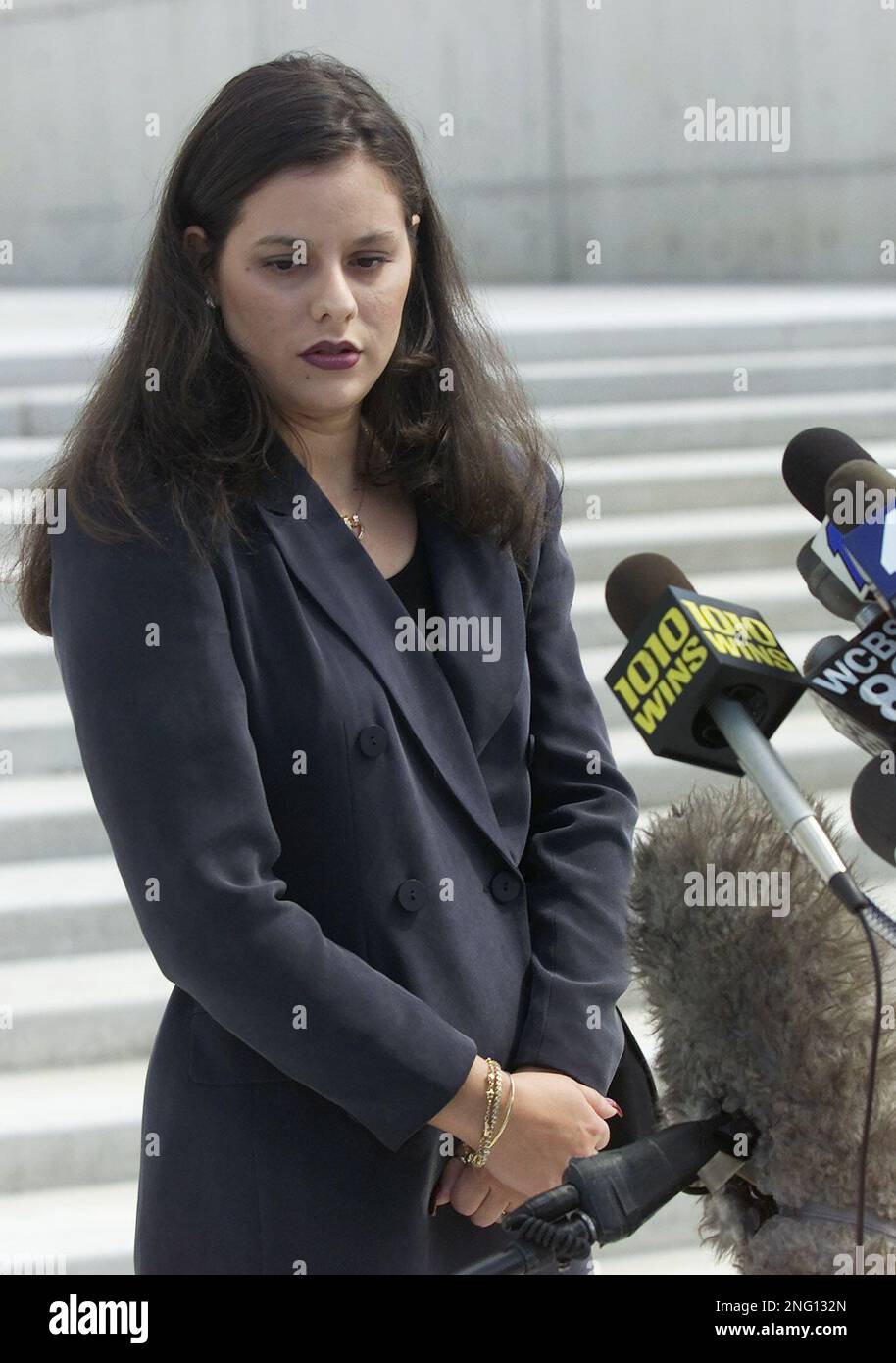 Cathy Serini speaks to reporters outside of Federal Court in Central ...