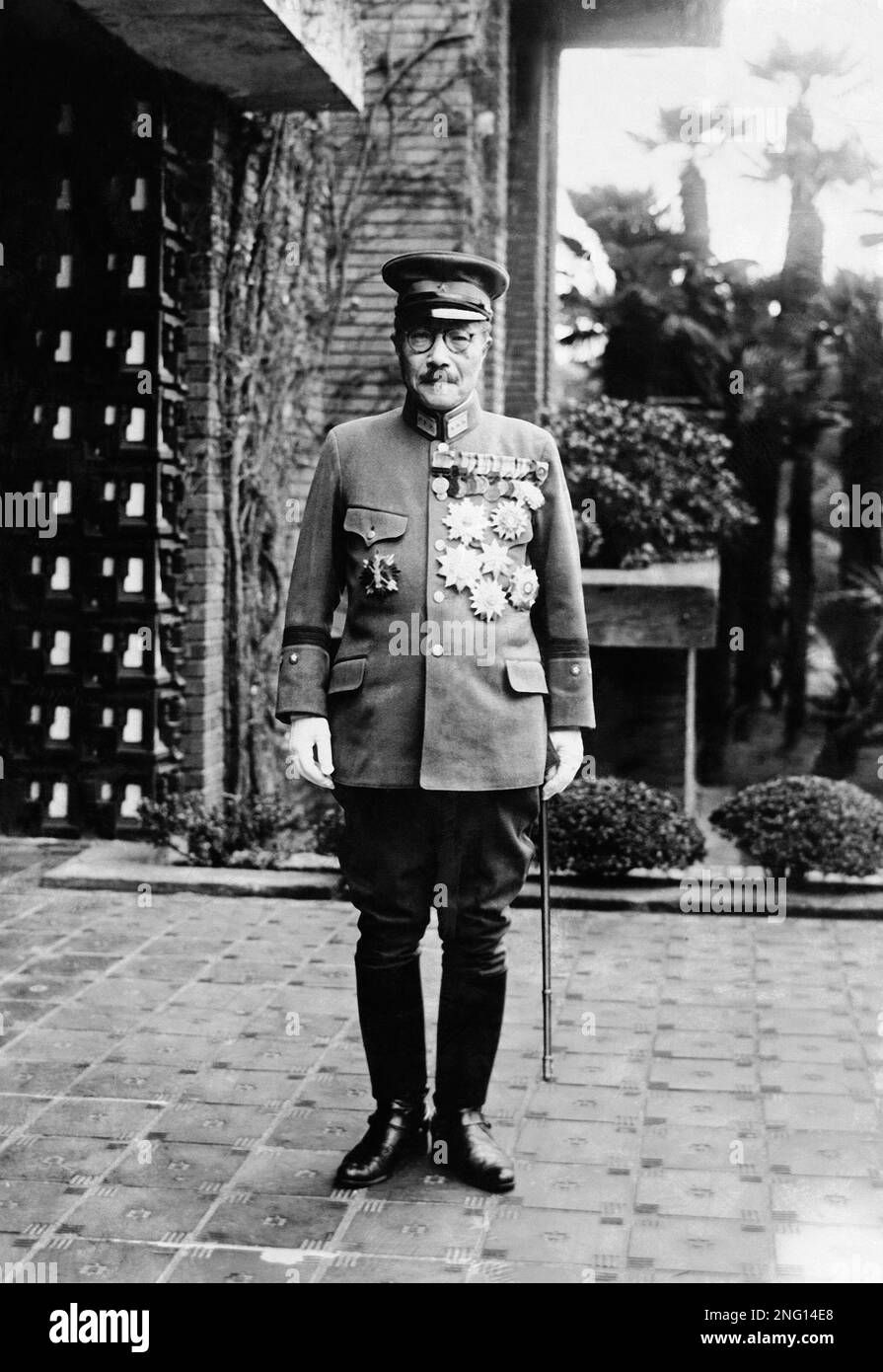 Prime Minister General Hideki Tojo is shown with medals outside of the ...