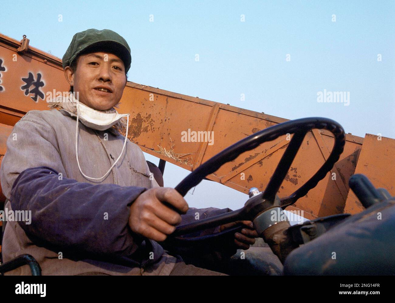 Farmer harvesting field in Beijing, China, November 1, 1985. (AP Photo ...