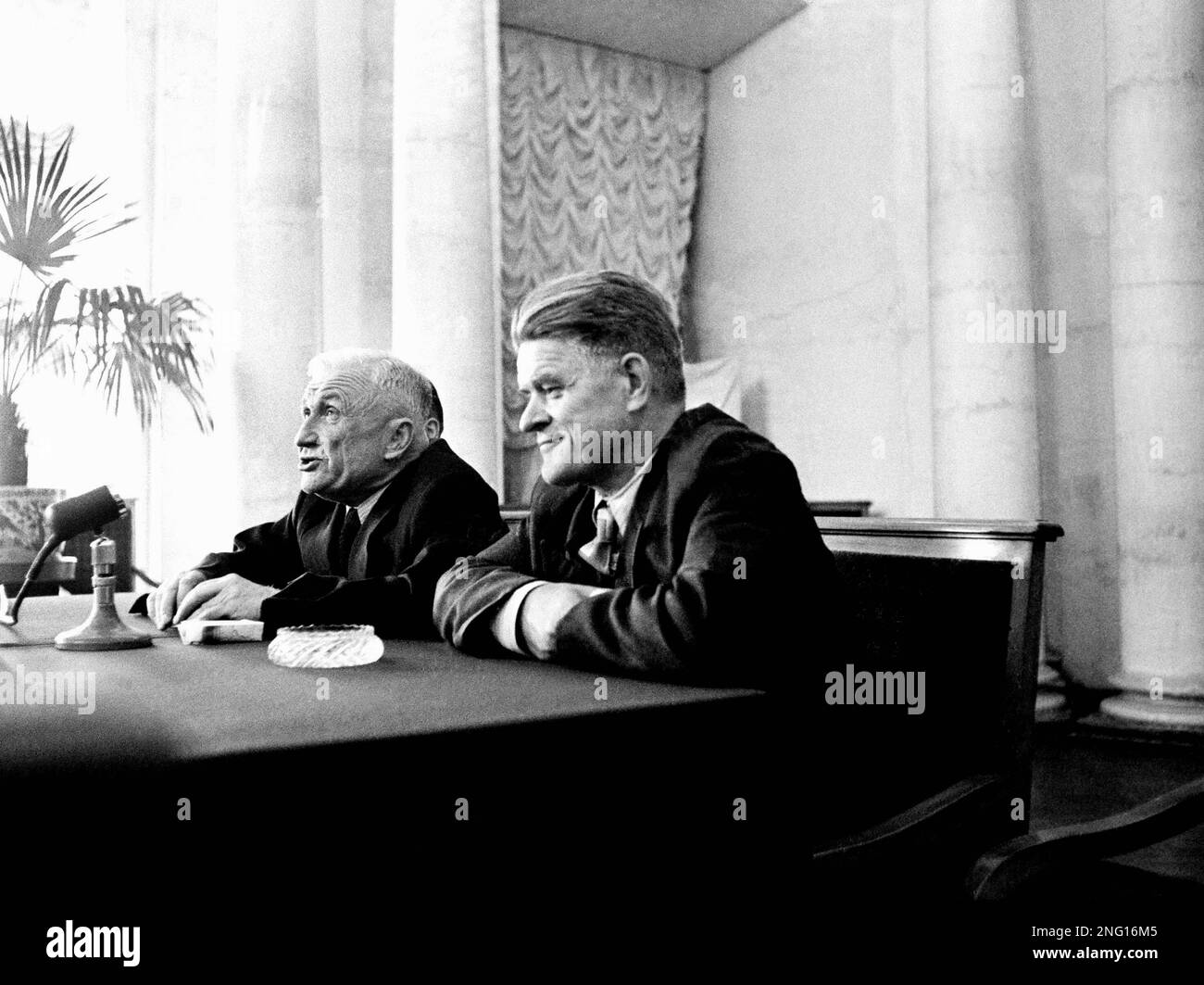 Soviet physicists Igor Tamm, left, and Pavel Cherenkov listen to Soviet ...