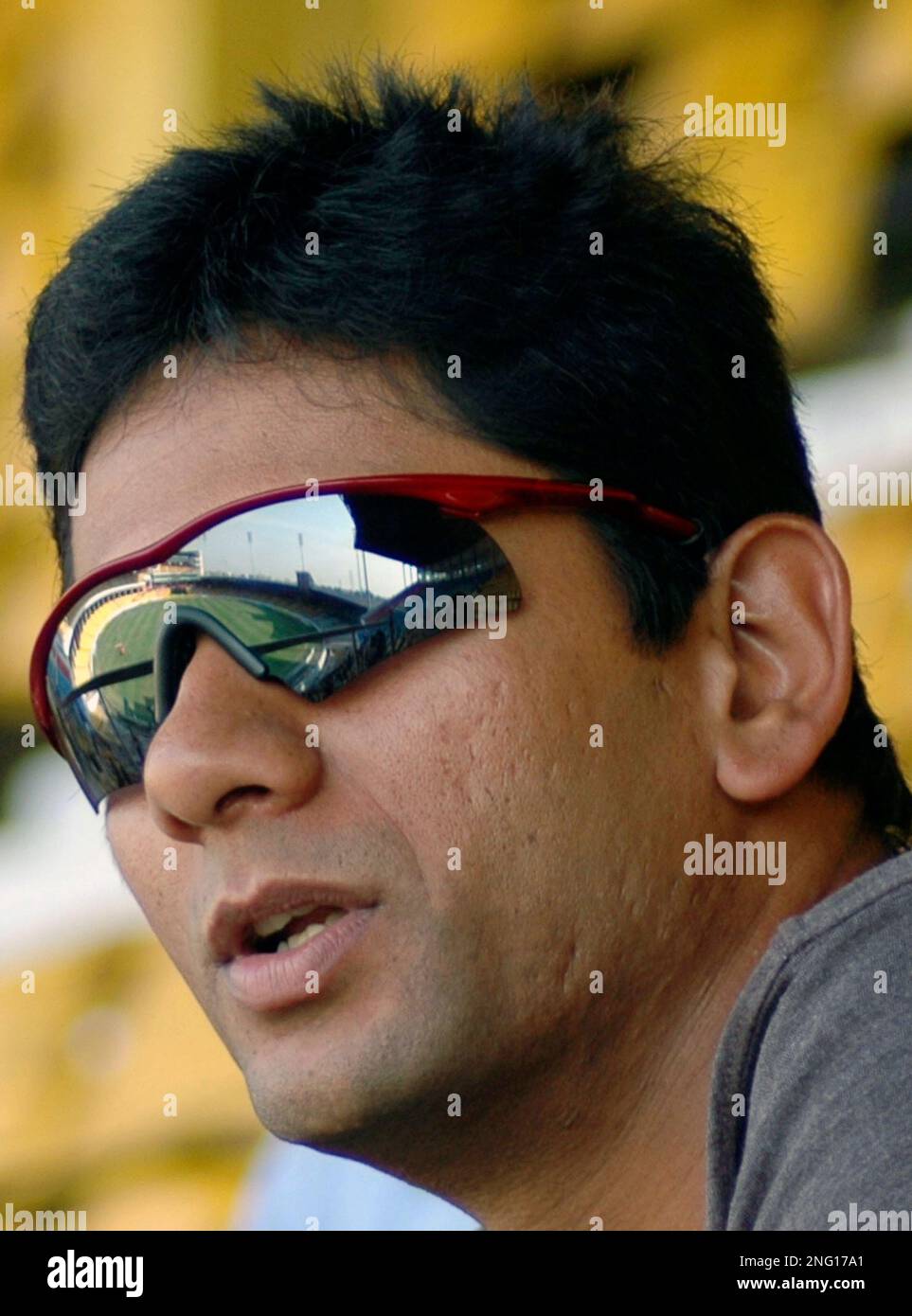 Indian cricket team's bowling coach Venkatesh Prasad watches the match ...