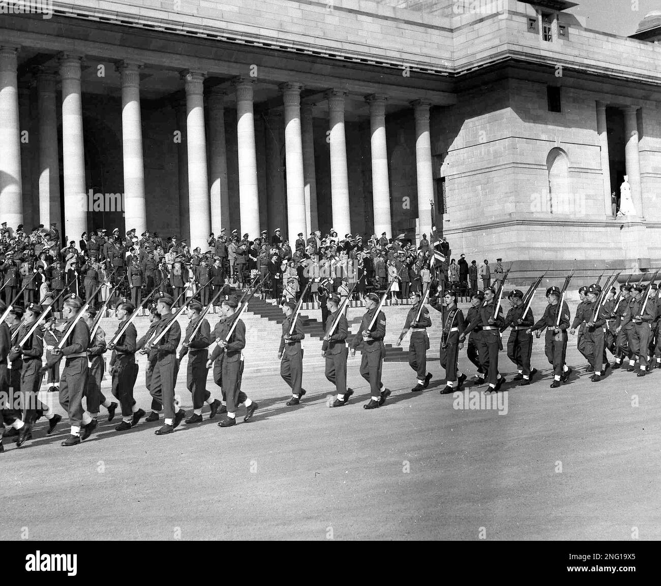 Britain's Earl Mountbatten, in naval uniform,centre, salutes the ...
