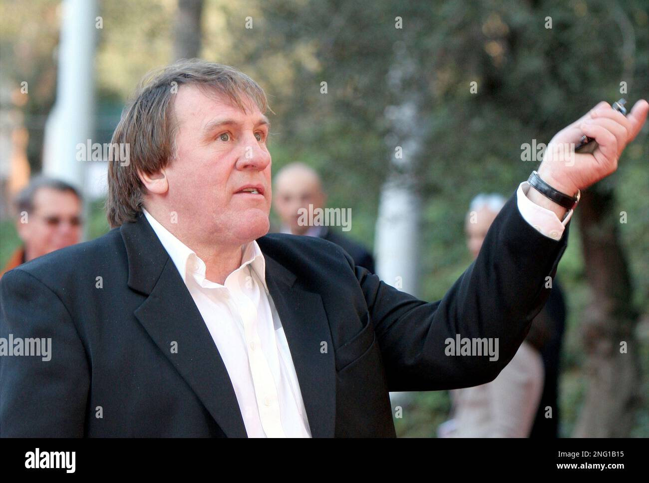 French actor Gerard Depardieu walks the red carpet as he arrives at the ...