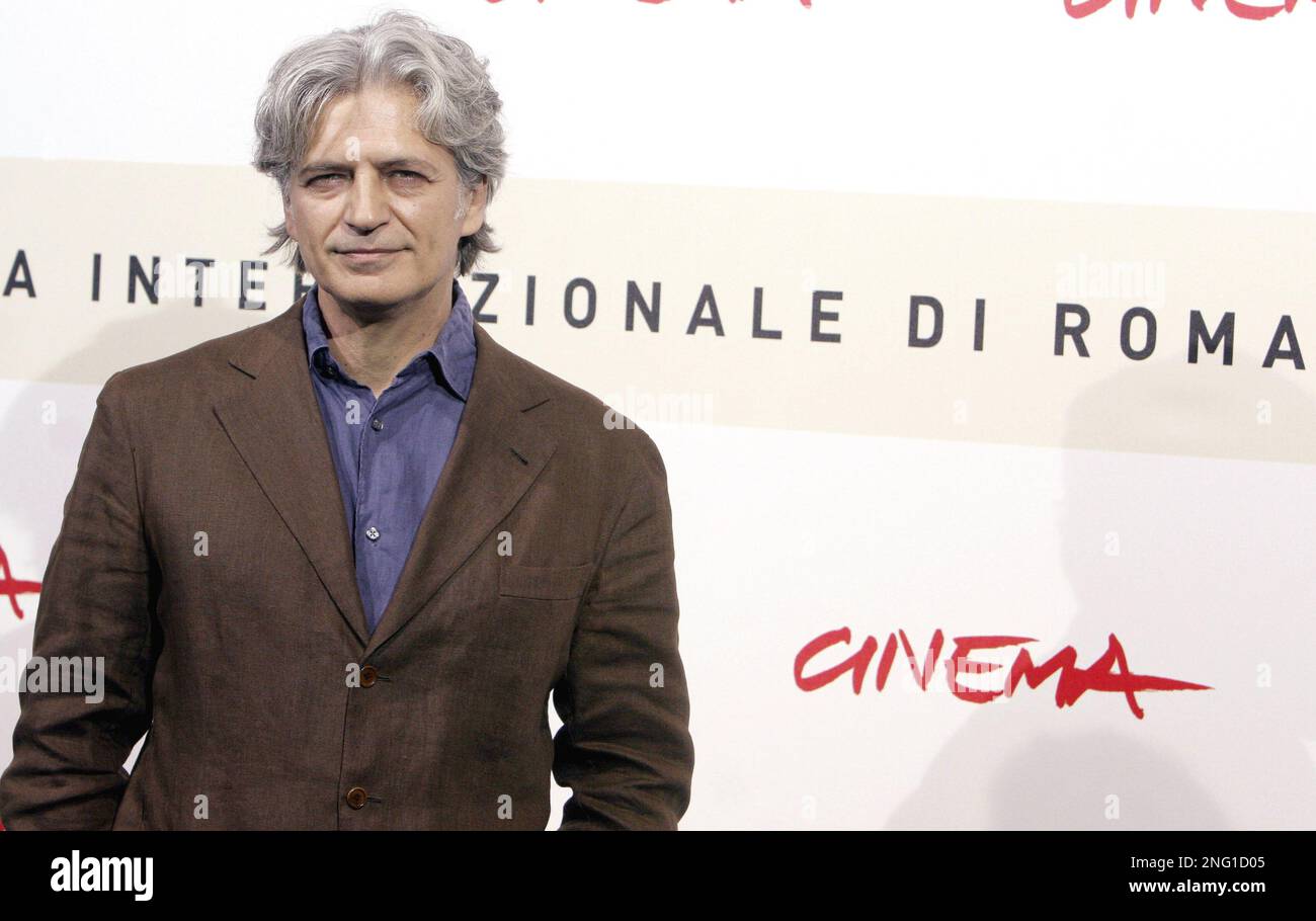 Italian actor Fabrizio Bentivoglio poses for photographers during the ...