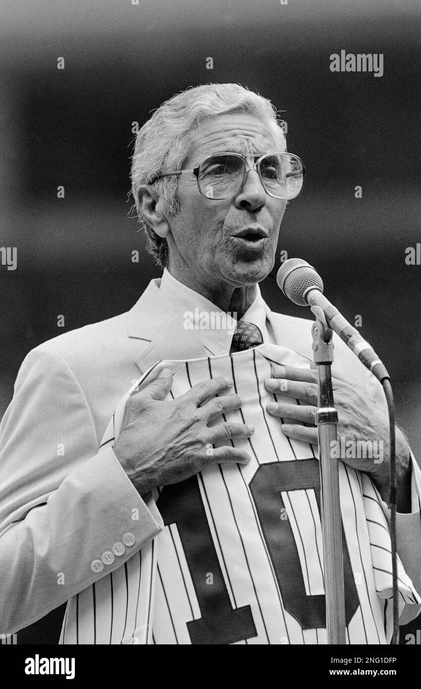 Famed New York Yankees shortstop Phil Rizzuto clutches his retired ...