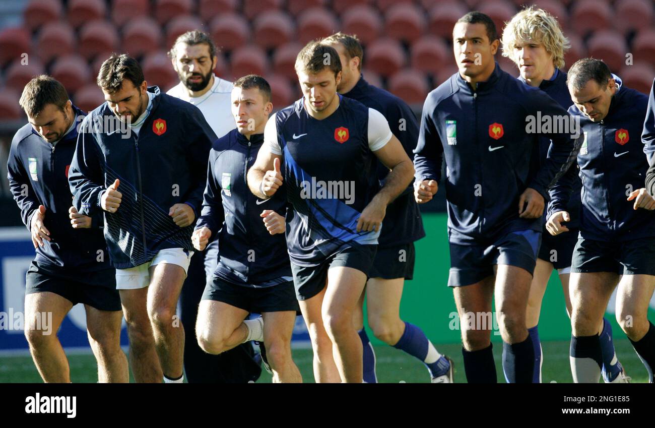 France's rugby team players run during a training session in Paris ...