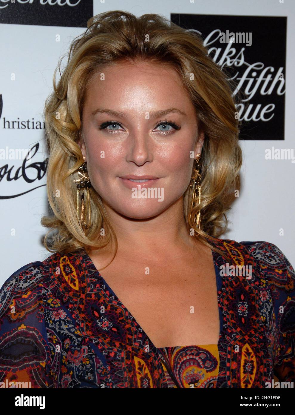 Actress Elisabeth Rohm poses on the press line at a cocktail party for ...