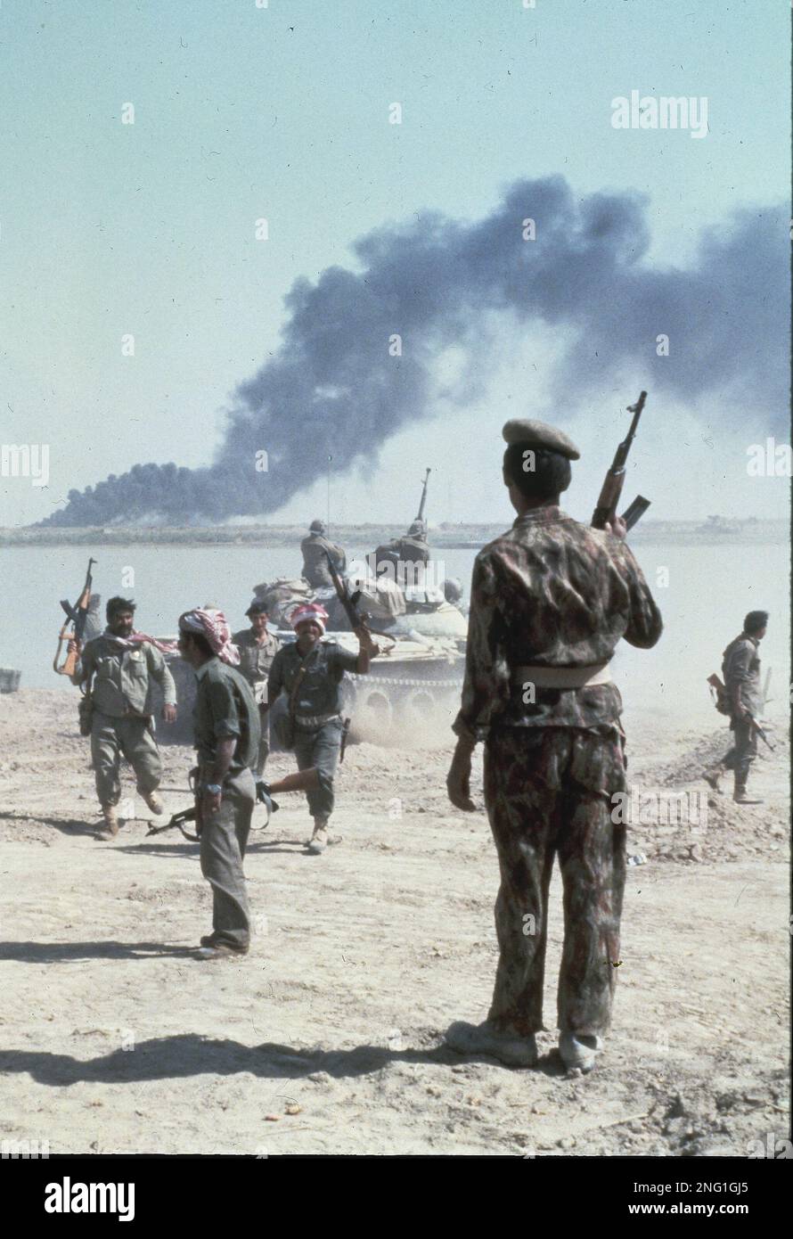 A Soviet-built tank of Iraq's army prepares to cross the Karoun River ...