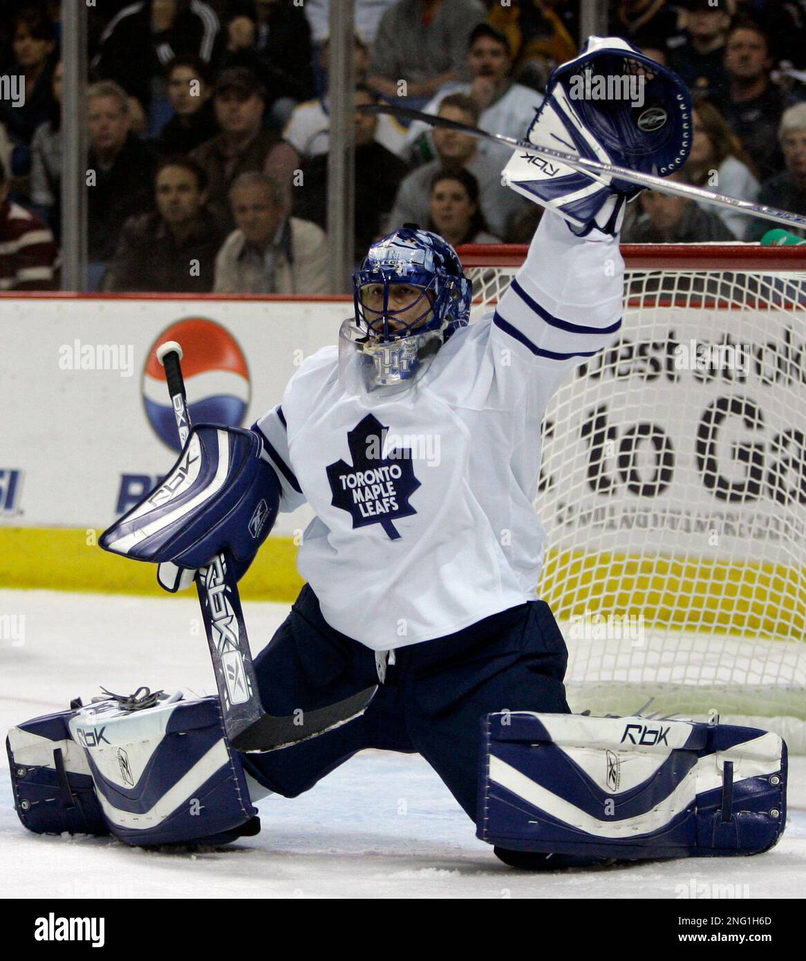 Toronto Maple Leafs goalie Andrew Raycroft makes a glove save during ...