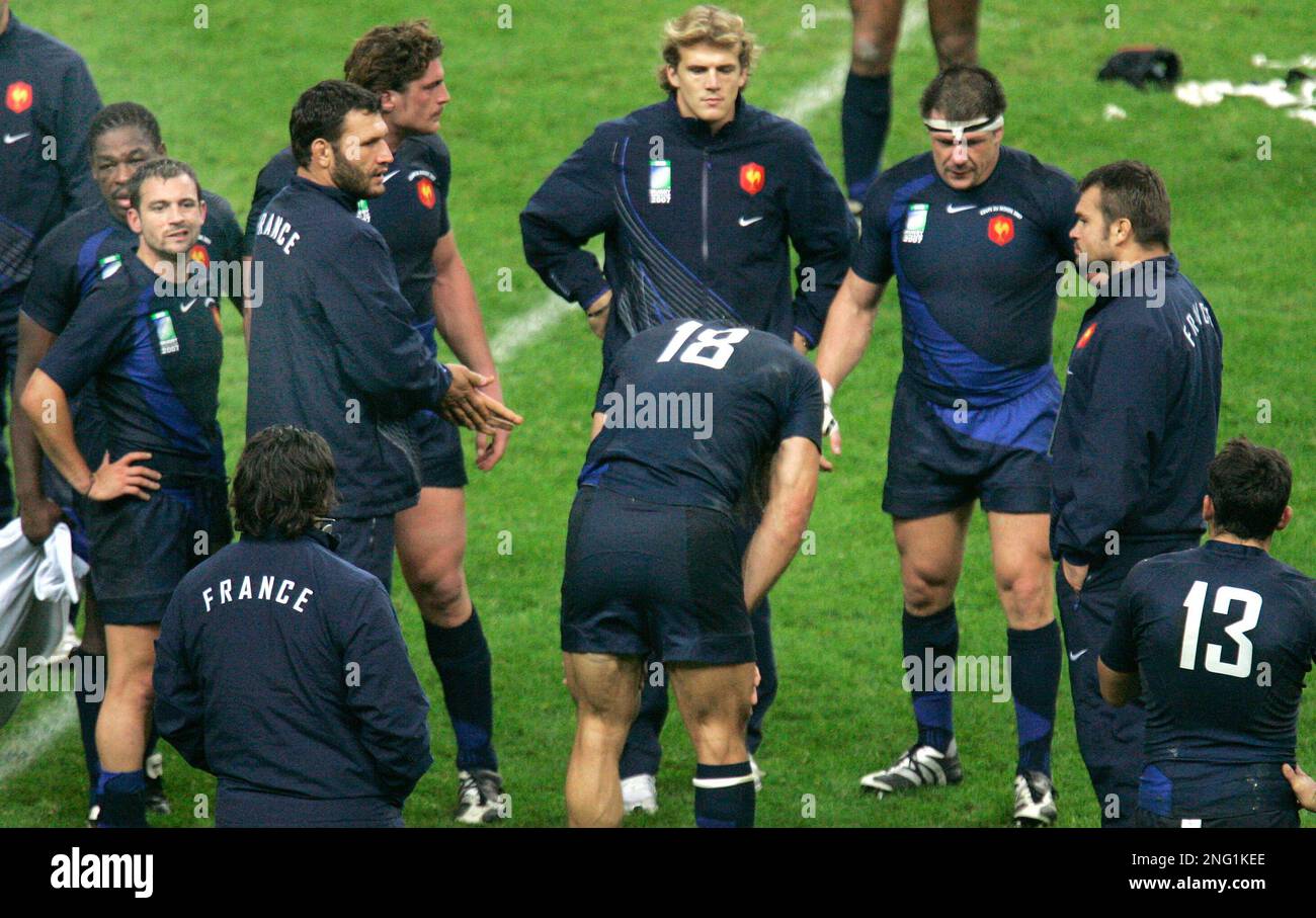 French players react after the Rugby World Cup semifinal match between ...