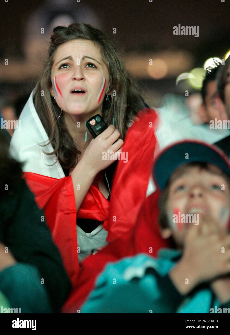 French supporters react as they watch the Rugby World Cup semifinal ...