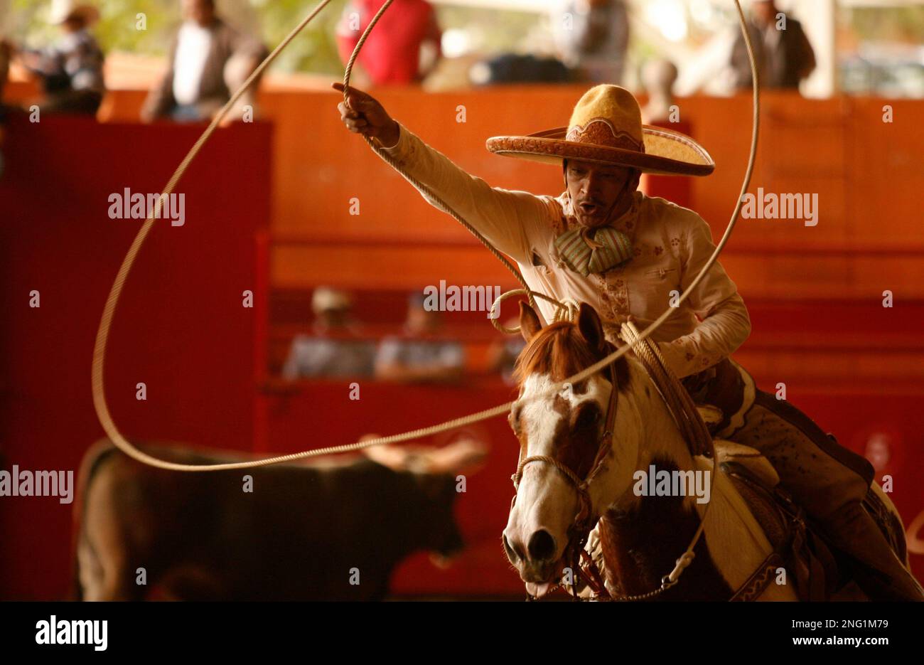 A Charro performs with his lasso during the 3rd State Charro ...