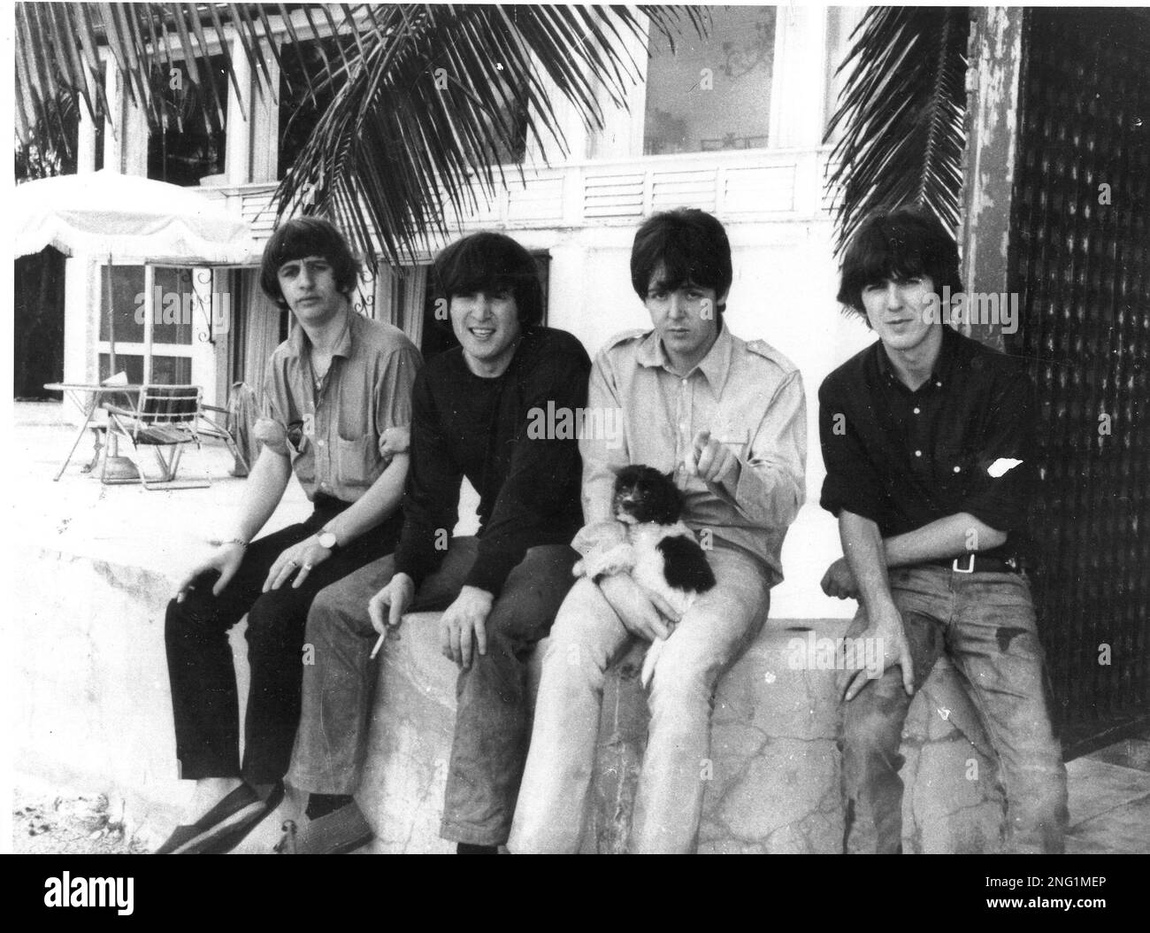 The Beatles are seen as they take it easy in Nassau, the Bahamas, where ...