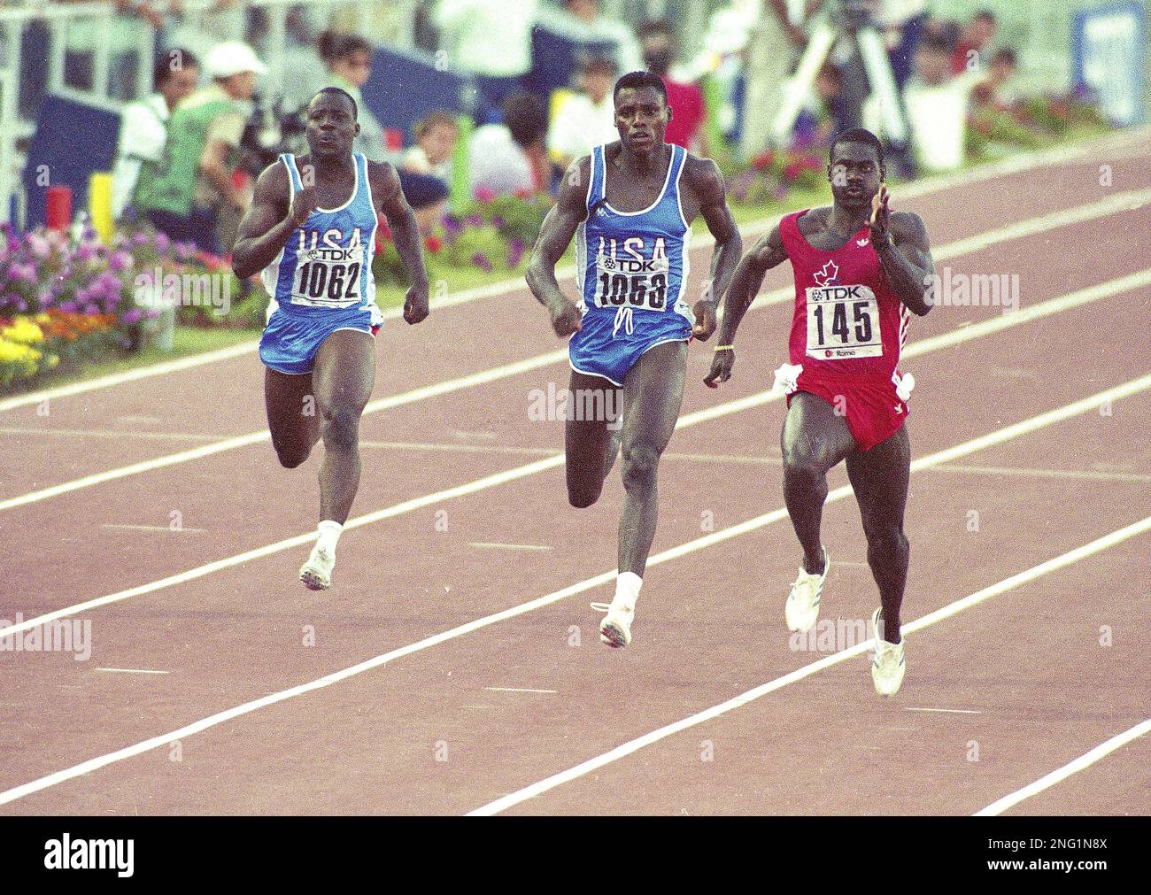 Ben Johnson, right, of Canada, wins the 100 meter dash at the World ...